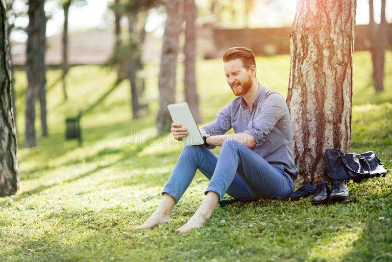 Handsome Student Reading in Nature Stock Photo - Image of beautiful ...