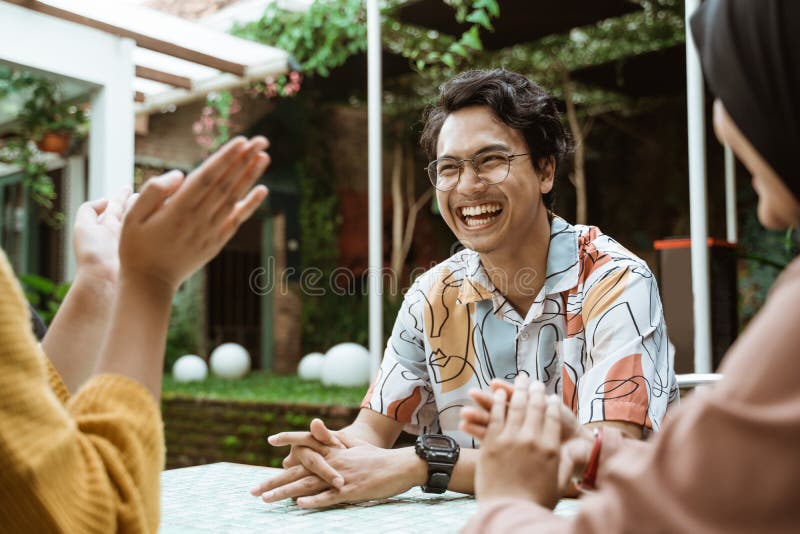 Handsome Students Laughing while Chatting while Hanging Out Stock Image ...