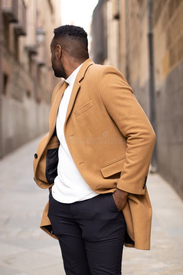 Handsome and Stylish African American Walking and Looking Back on a ...