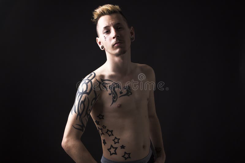 Handsome Stylish Young Man with Tattoo and Piercing Stock Photo - Image ...