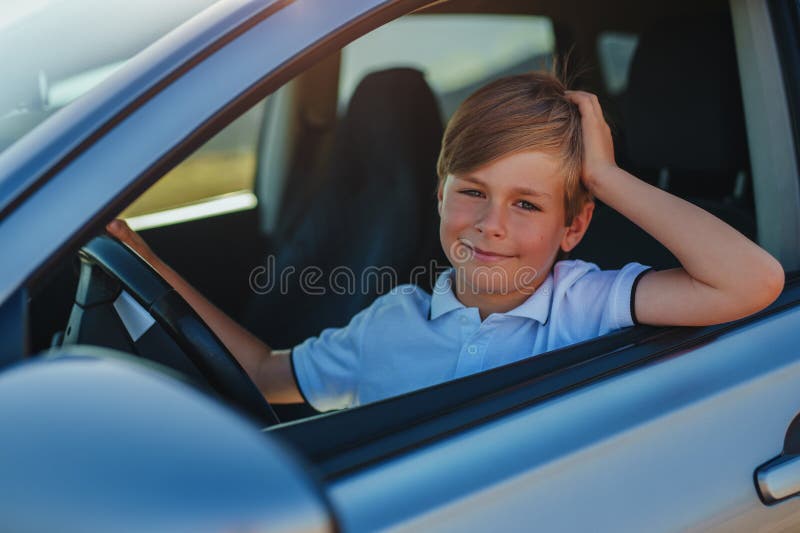 Smiling Boy Sitting in Driver S Seat of the Car Stock Image - Image of ...