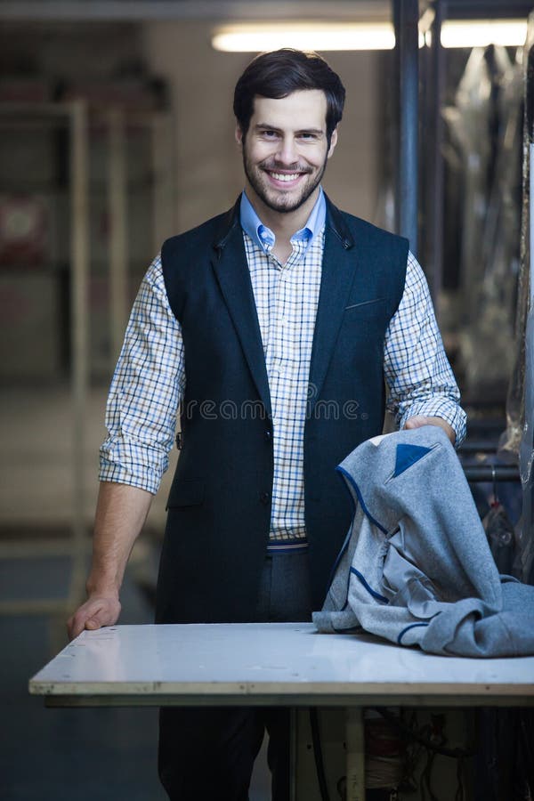 Handsome tailor man stock photo. Image of factory, showing - 37357948
