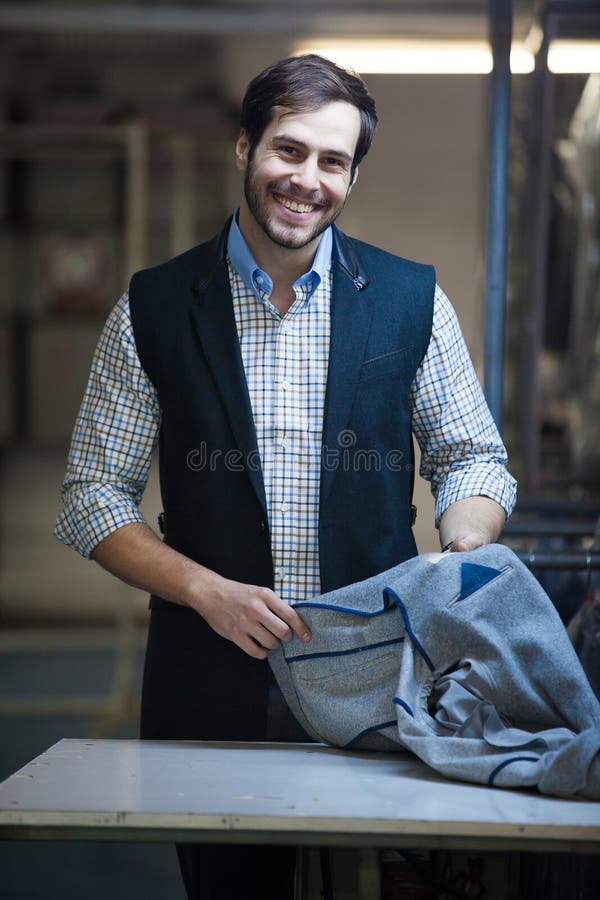 Handsome tailor man stock photo. Image of factory, showing - 37357948