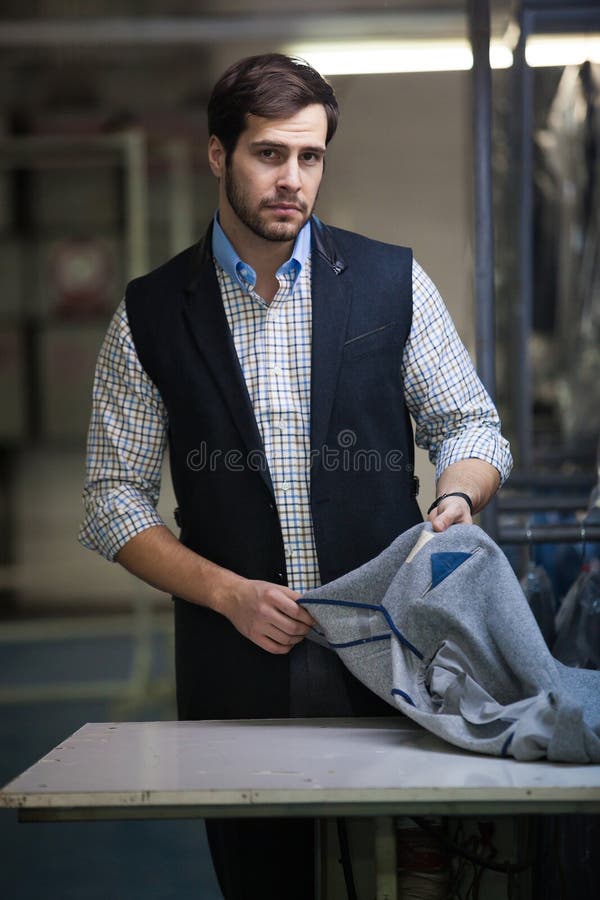 Handsome tailor man stock image. Image of uniform, thinking - 37345983