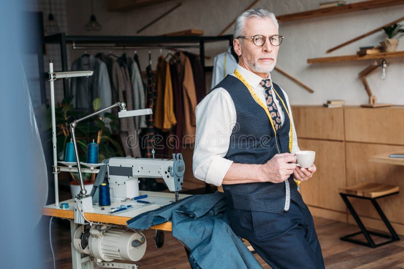 Handsome Tailor Standing with Cup of Coffee Stock Photo - Image of ...