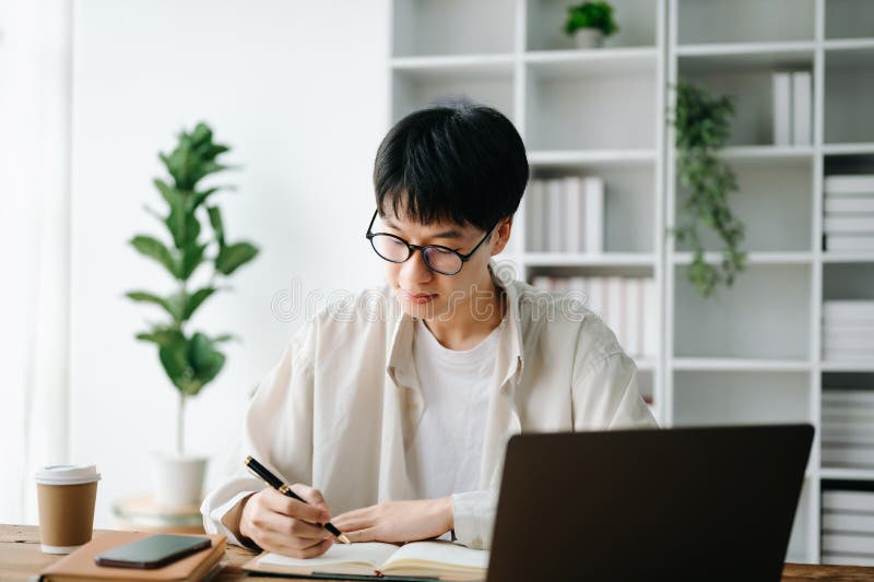 Handsome and Talented Young Asian Man Student Working on His Project ...