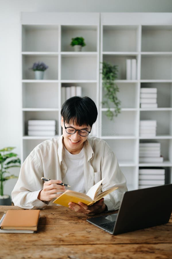 Handsome and Talented Young Asian Man Student Working on His Project ...