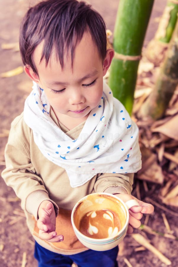 Handsome Thai Baby Boy Holding Coffee Cup Stock Image - Image of brown ...