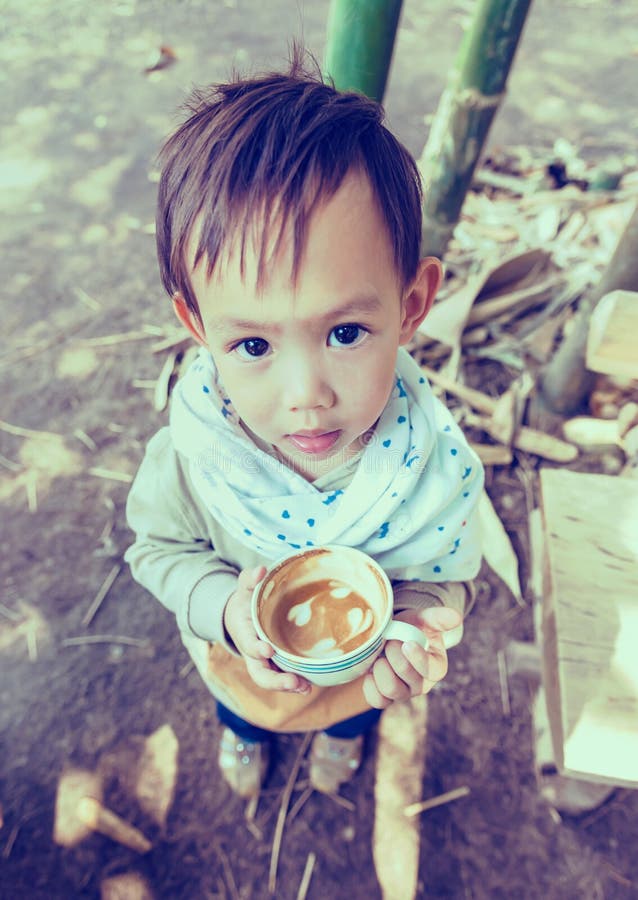 Handsome Thai Baby Boy Holding Coffee Cup Stock Image - Image of wood ...