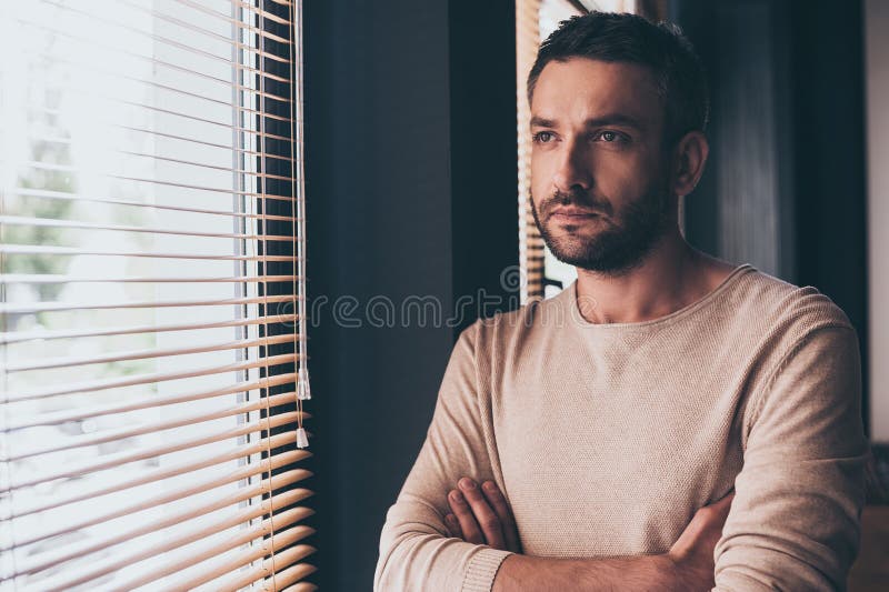 Young Man Looking Trough Window Stock Photos - Free & Royalty-Free ...