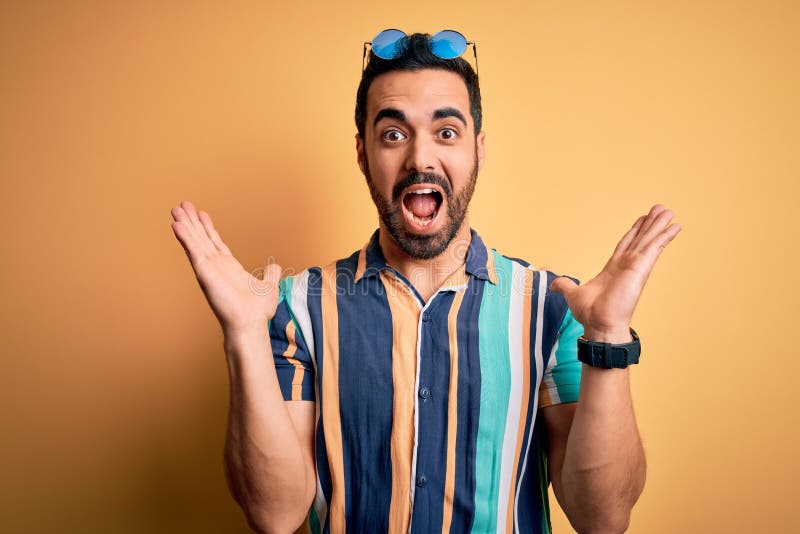 Handsome Tourist Man With Beard On Vacation Wearing Summer Striped
