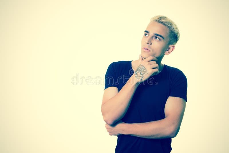 Handsome Trendy Pensive Young Guy. Pensive Looking Up Stock Image ...