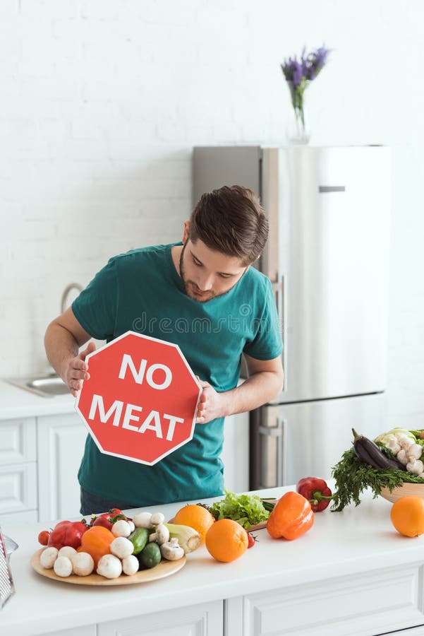 Handsome Vegan Man Looking at No Meat Sign Stock Photo - Image of tasty ...