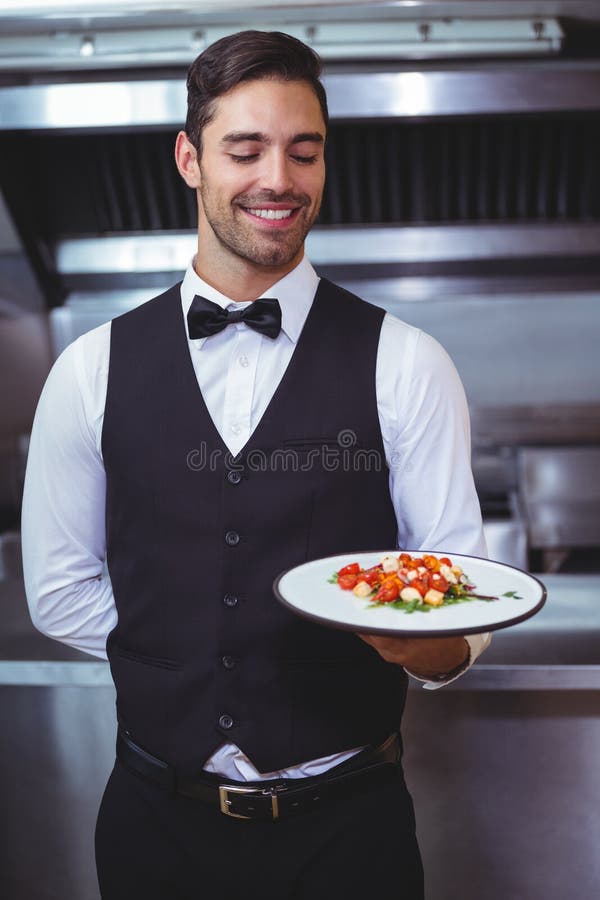 Handsome Waiter Holding a Plate Stock Image - Image of high, staff ...