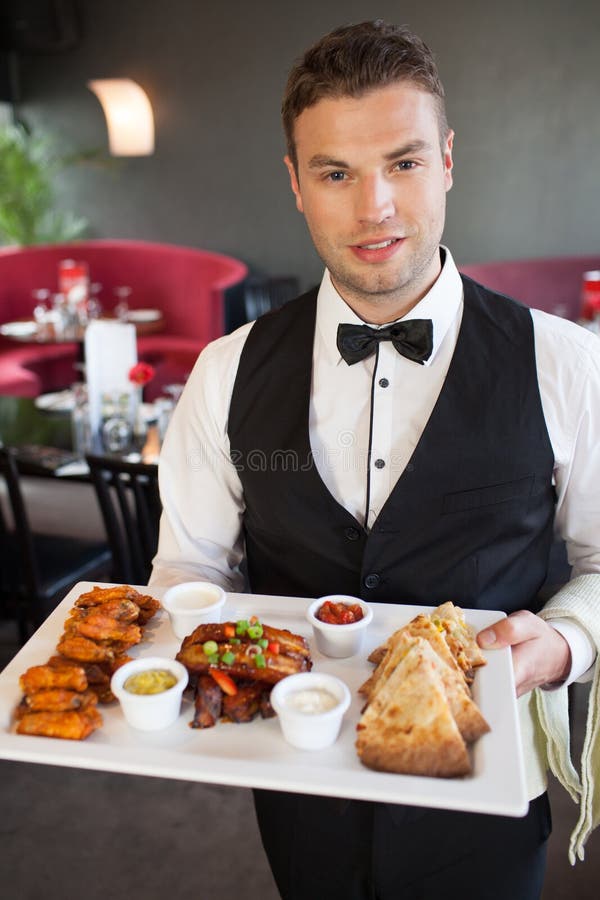 Handsome Waiter Serving Appetizing Finger Food Platter Stock Photo ...