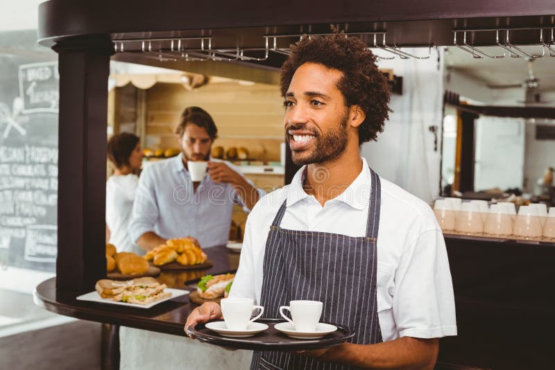 Handsome Waiter Smiling and Holding Tray Stock Photo - Image of front ...