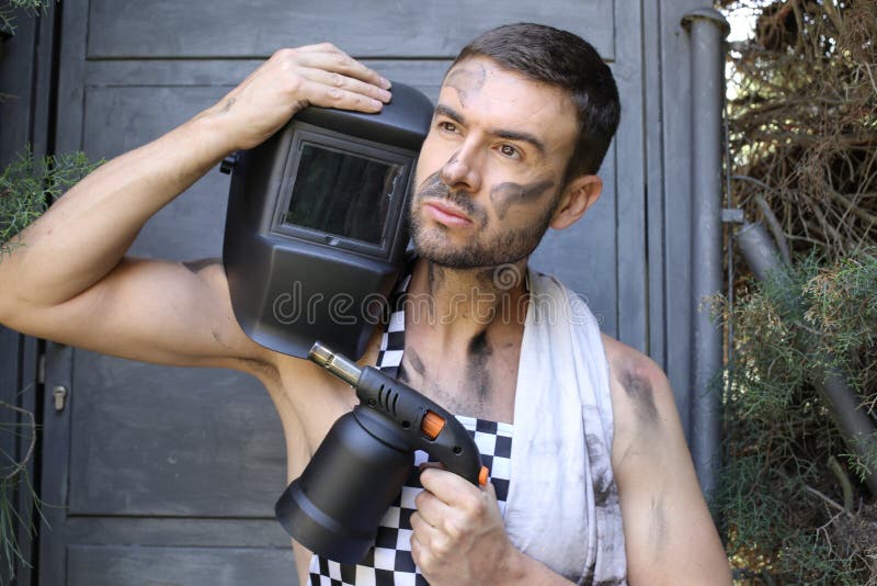 Handsome Welder Holding a Blowtorch Stock Image - Image of arabic ...