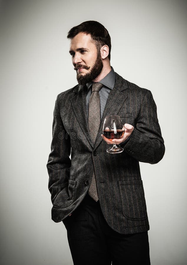 Handsome well-dressed man stock photo. Image of moustache - 46753554