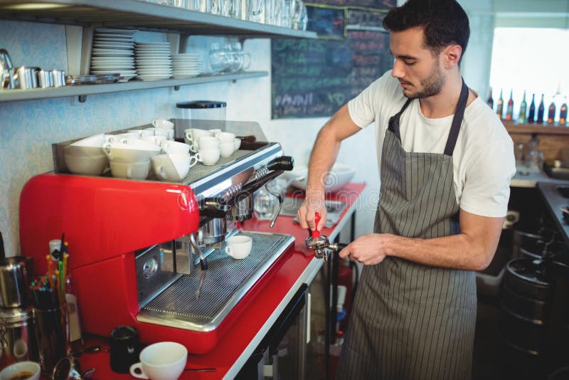 Handsome Worker Using Strainer at Cafe Stock Photo - Image of male ...