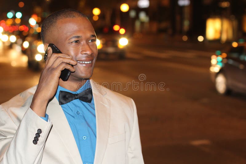 Handsome Young African Man Talking on Mobile Phone in Night City Stock ...