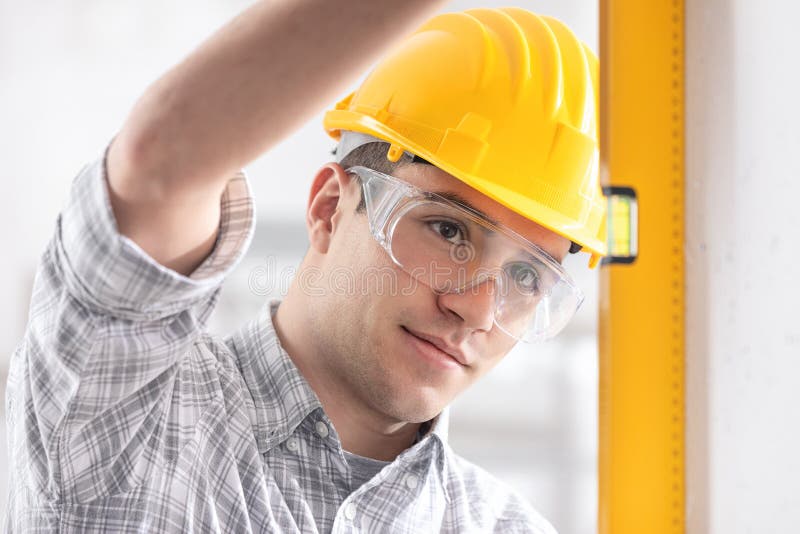 Handsome Young Architect Checking Level Stock Image - Image of ...