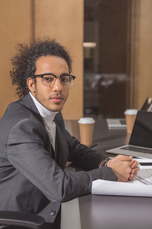 Handsome Young Architect in Suit Sitting at Workplace Stock Photo ...