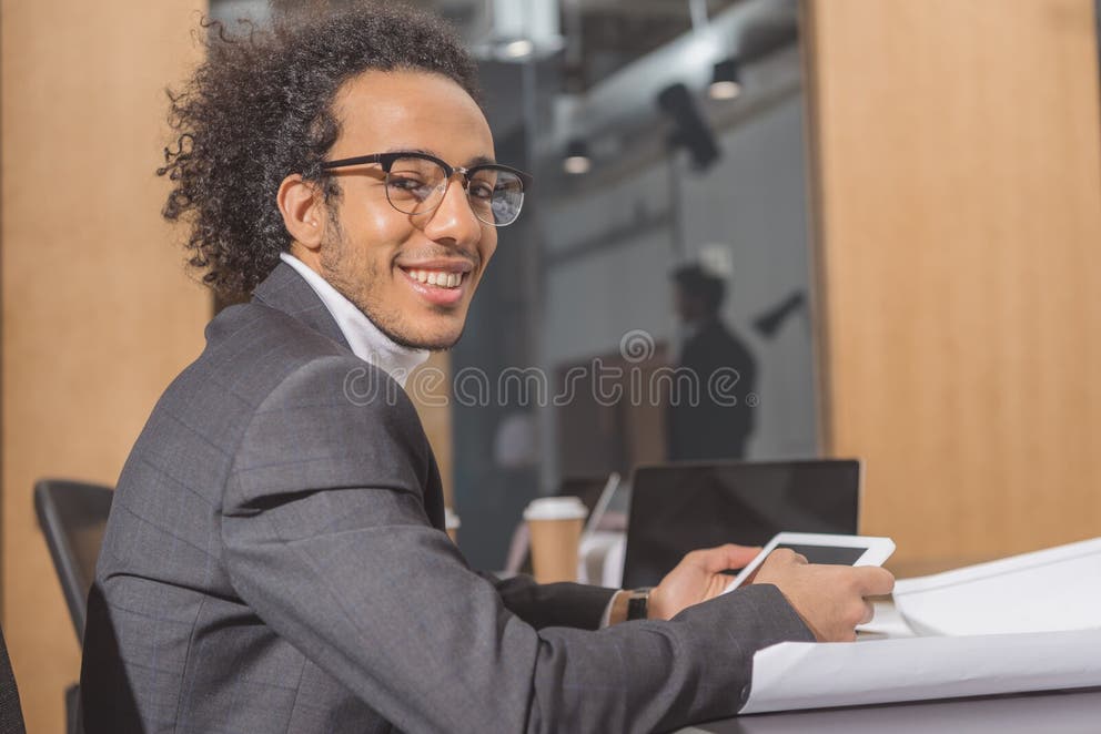 Handsome Young Architect in Suit Sitting at Workplace at Office Stock ...