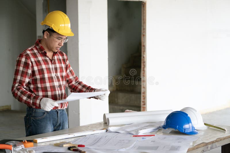 Handsome Young Asian Man Architect or Engineer in a Building ...