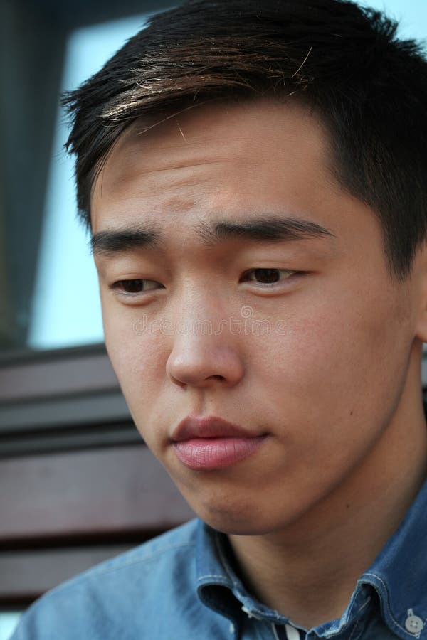 Handsome young Asian man stock photo. Image of downward - 52282390