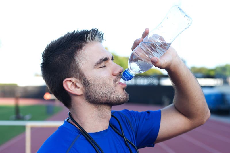 Athlete Drinking Water during Morning Jog Stock Photo - Image of ...