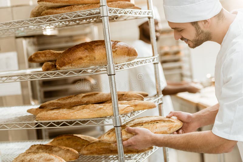 Closeup Perfect Look of Young Woman Baker in a Bakery she Smelling ...