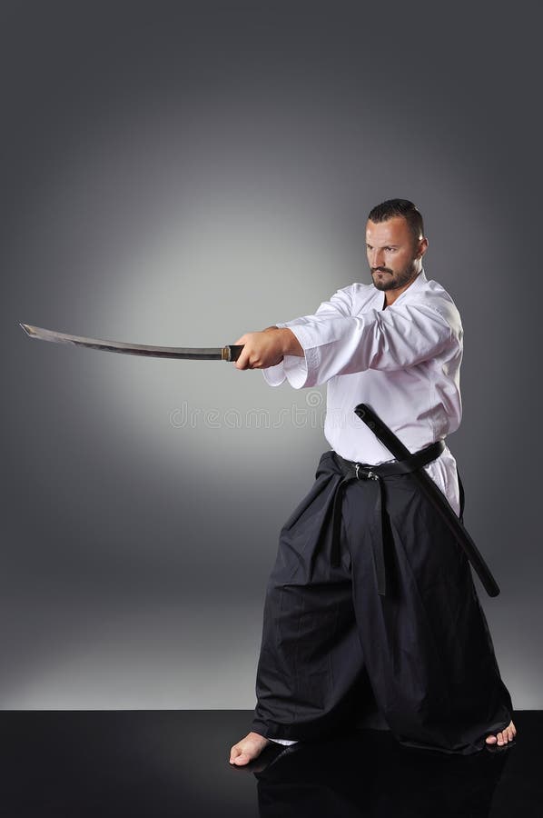 Handsome Young Black Belt Male Karate Posing with Sword Stock Photo ...