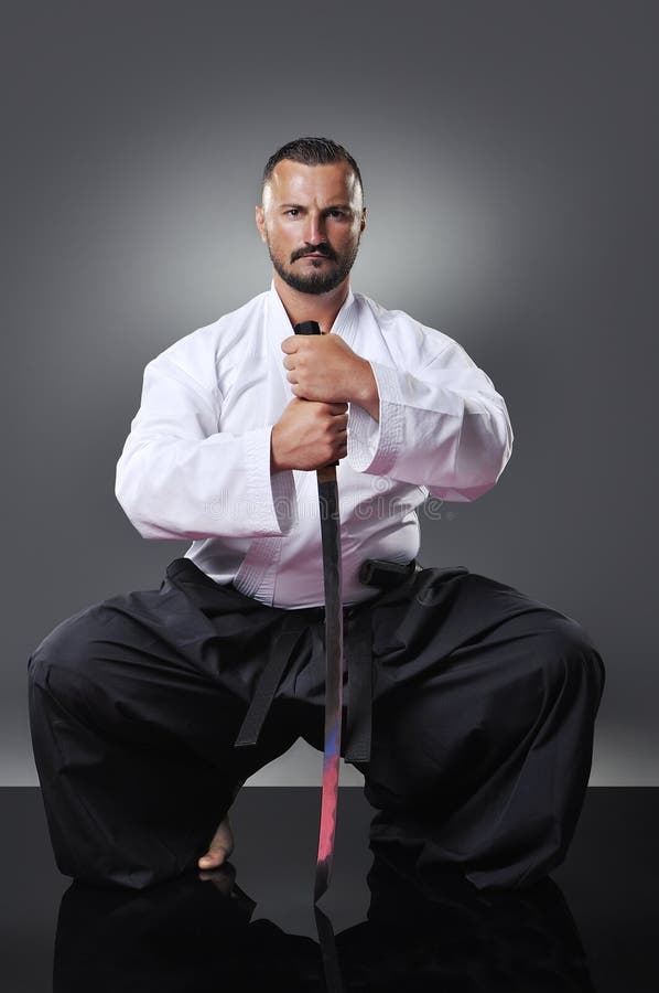 Handsome Young Black Belt Male Karate Posing with Sword Stock Image ...