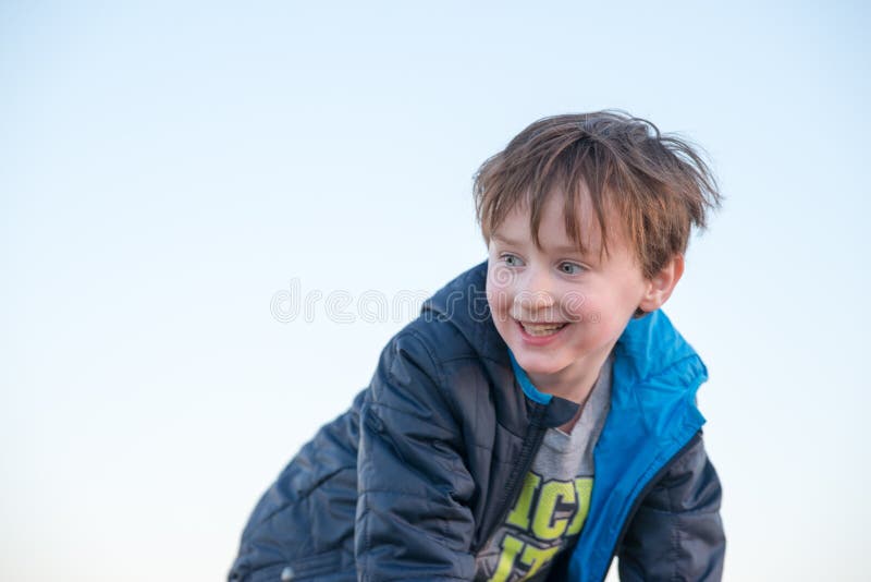 Handsome Young Boy Outside Smiling at Sunset Golden Hour Stock Image ...
