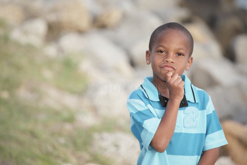 Handsome Young Boy Pondering Stock Image - Image of blur, outside: 14221947