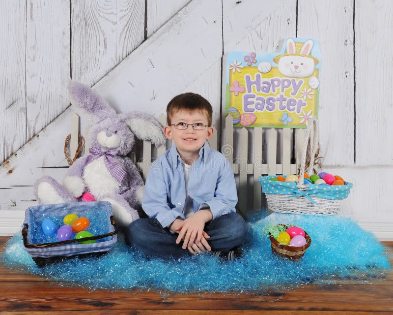 Handsome Young Boy Sitting in Easter Scene Stock Photo - Image of ...