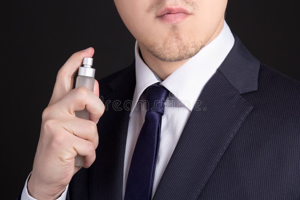 Handsome Young Business Man Using Perfume Stock Photo - Image of ...