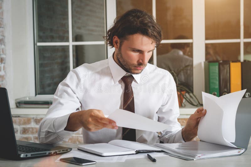 Handsome Young Businessman stock photo. Image of break - 76340770