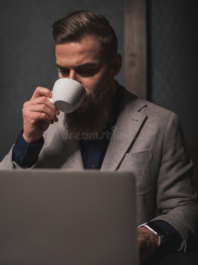 Handsome Young Businessman Wih Computer in His Workplace Stock Photo ...