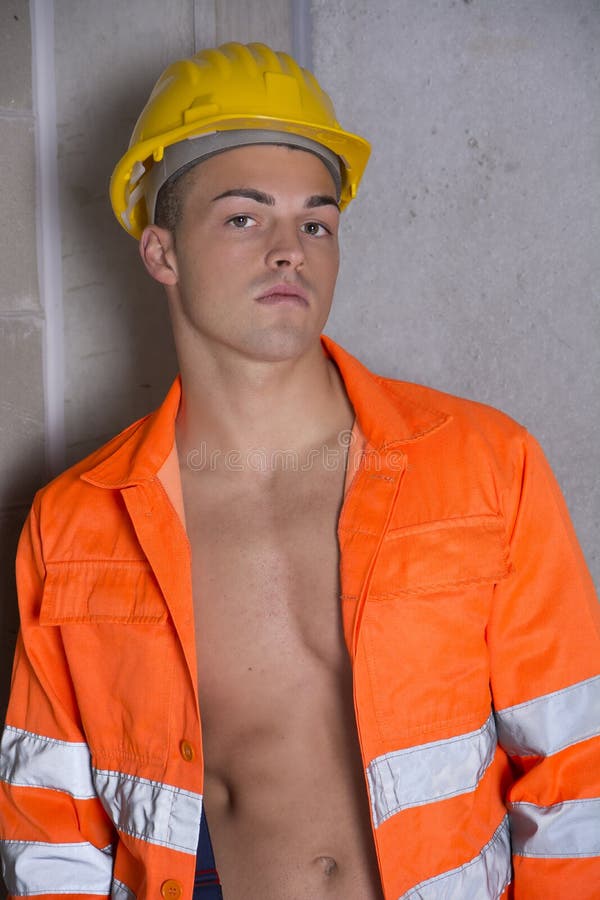 Handsome Young Construction Worker with Orange Suit and Hardhat Stock ...
