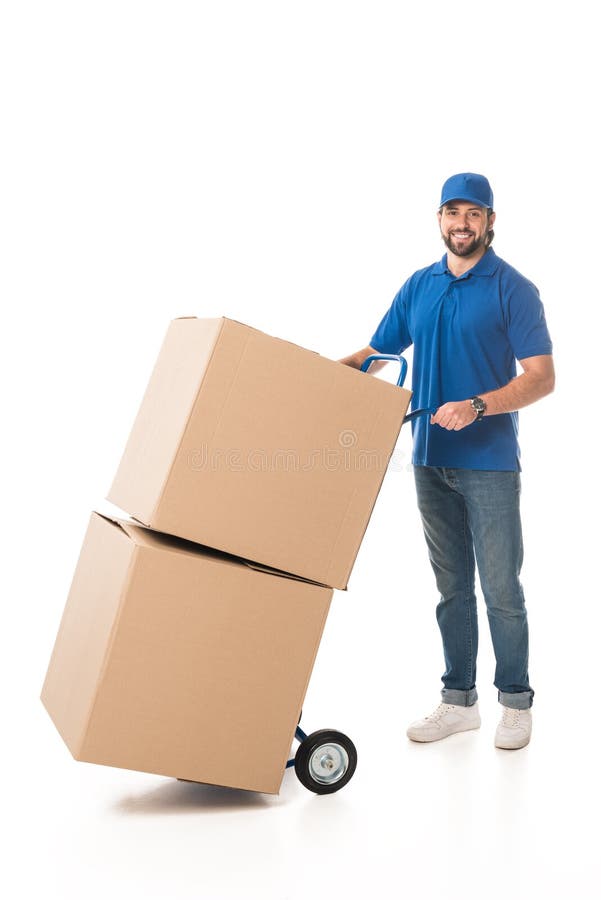 Handsome Young Delivery Man Carrying Boxes and Smiling at Camera Stock ...