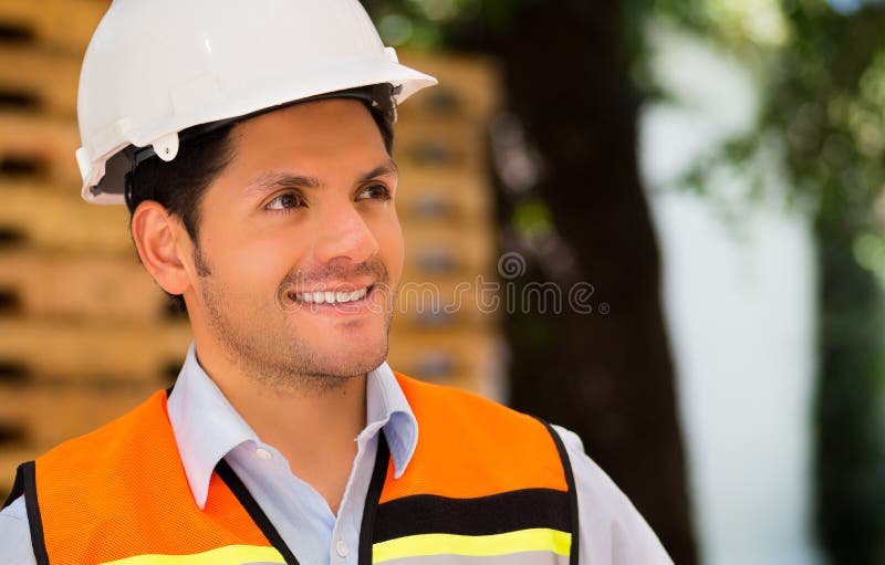 Handsome Young Engineer Looking Away at Construction Site Stock Image ...