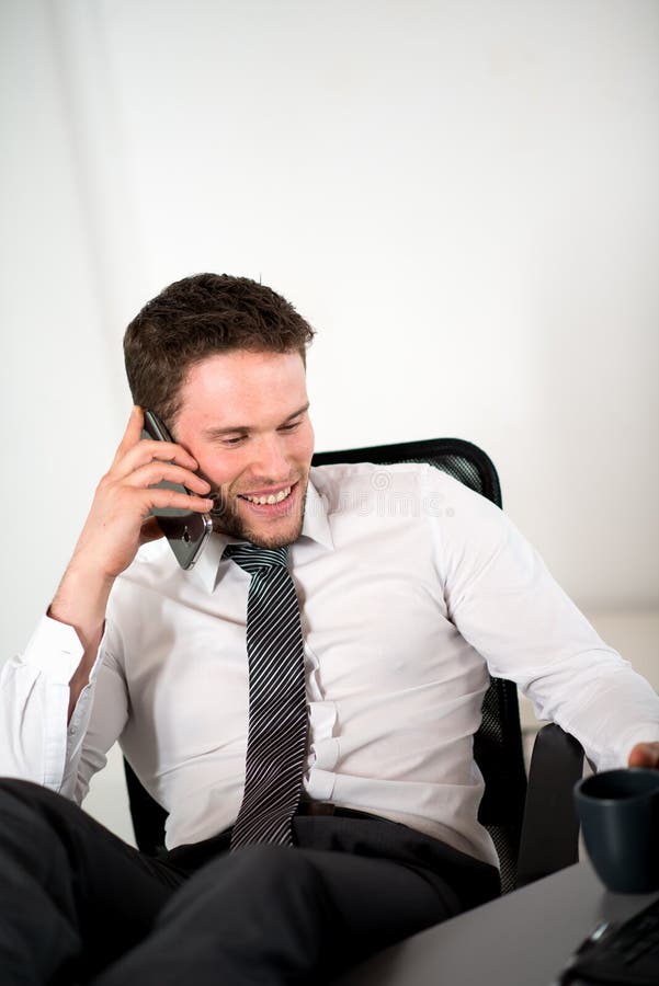 Handsome Young Executive Business Man in Office Stock Image - Image of ...