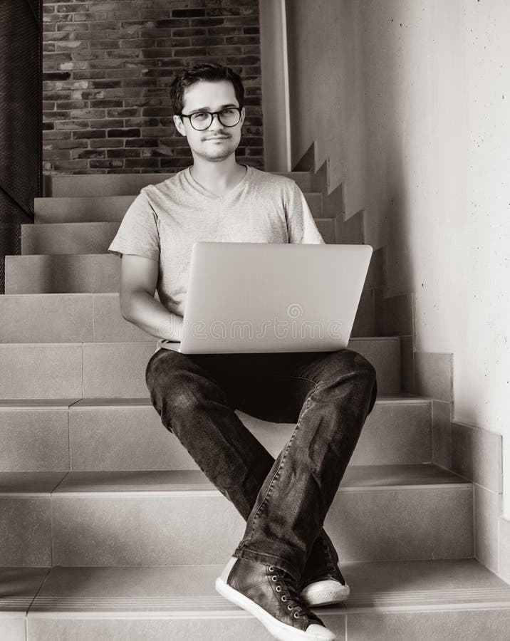 Handsome Young Freelancer Man Using Laptop Computer Stock Photo - Image ...