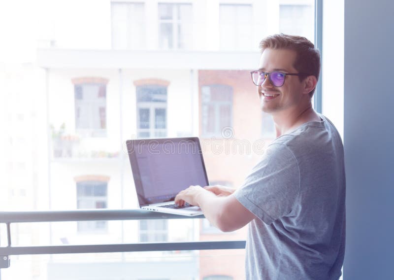 Handsome Young Freelancer Man Using Laptop Computer Stock Photo - Image ...