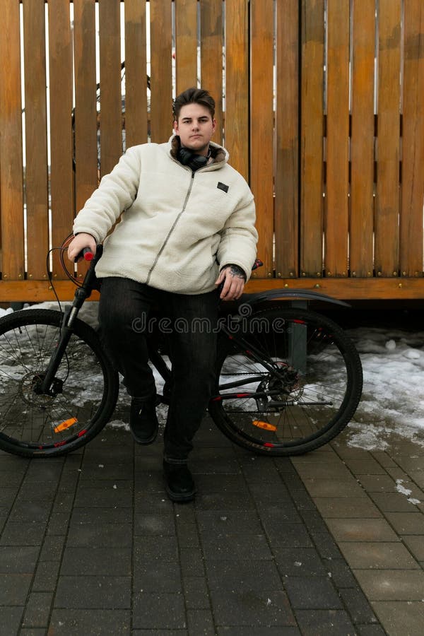 A Handsome Young Guy Rides Around the City on a Bicycle Stock Photo ...
