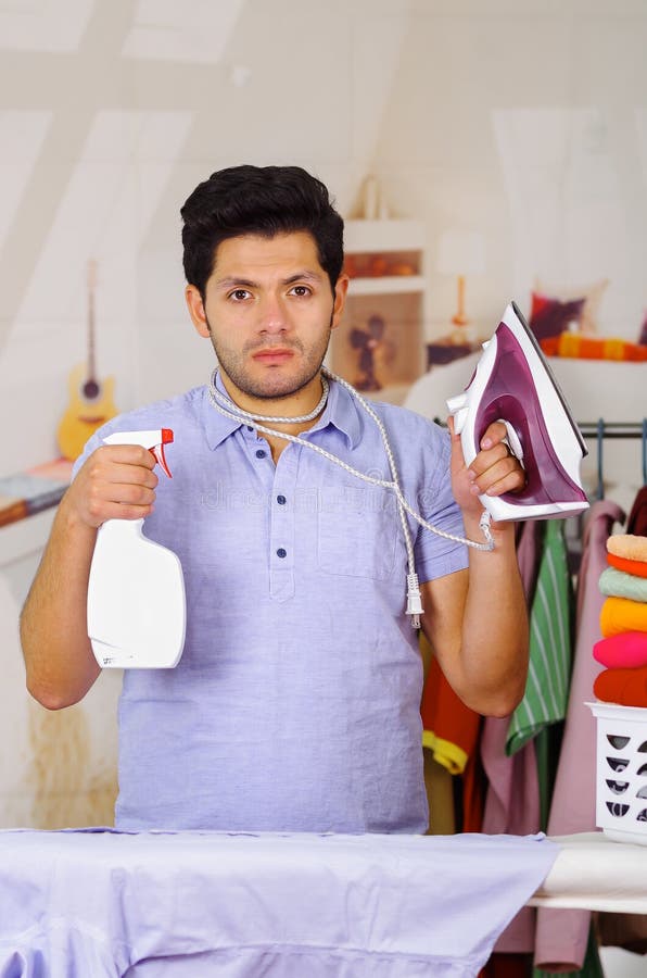 Handsome Young Happy Man Ironing Clothes on Ironing Board Stock Photo ...