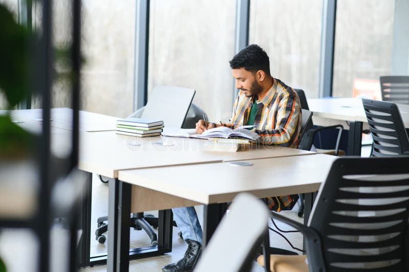 Handsome Young Indian Boy Student with Books and Backpack at University ...