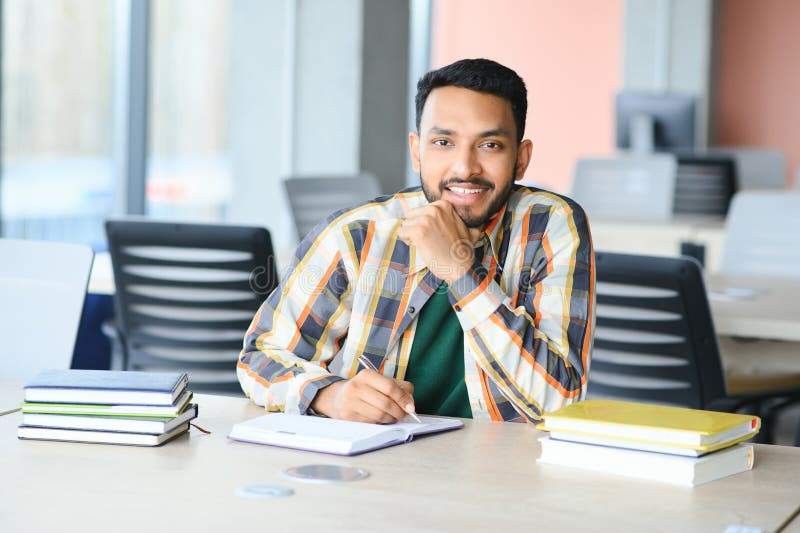 Handsome Young Indian Boy Student with Books and Backpack at University ...