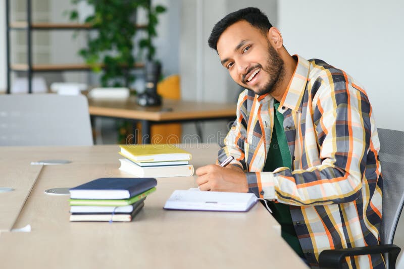 Handsome Young Indian Boy Student with Books and Backpack at University ...